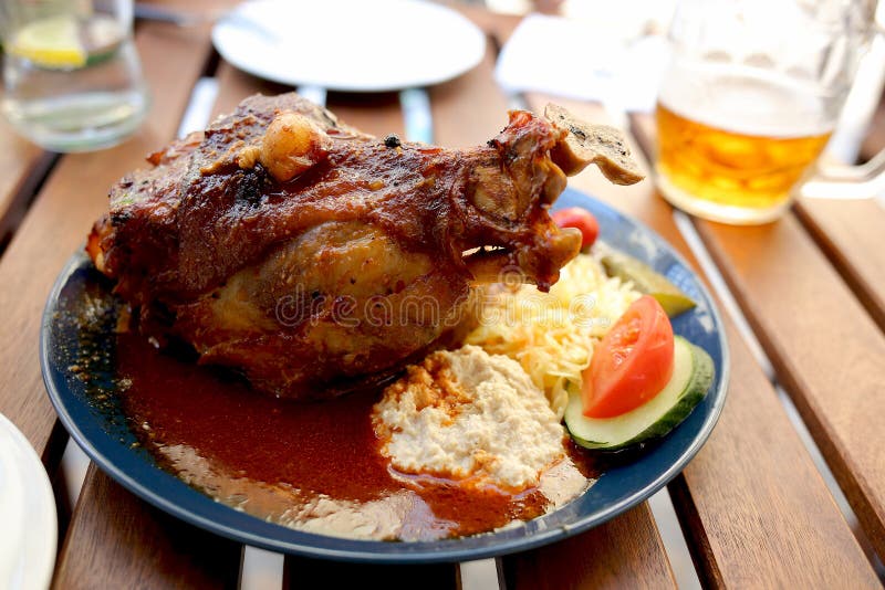 Traditional Czech Dinner with Pork Leg and Beer in a Restaurant Stock ...