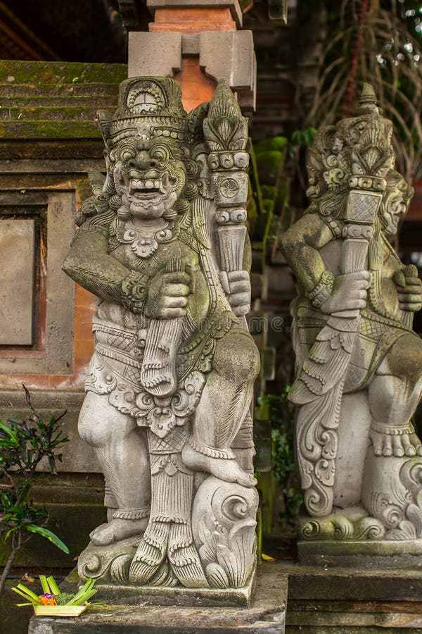 Traditional Demon Guards Statue Carved in Stone in Bali. Architecture ...