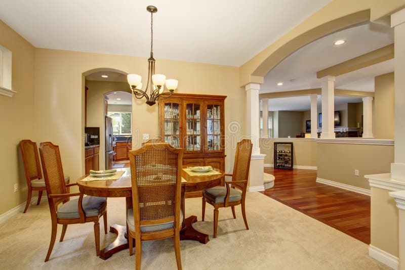 Traditional Dinning Room with Carpet, and Nice Table Set. Stock Photo ...