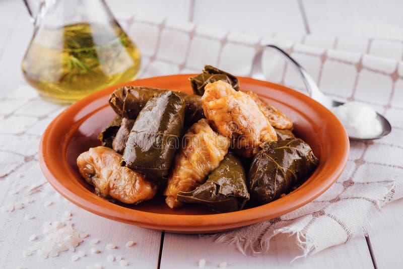 Traditional Dolma Stuffed Grape Leaves with Rice and Spices on Rustic ...