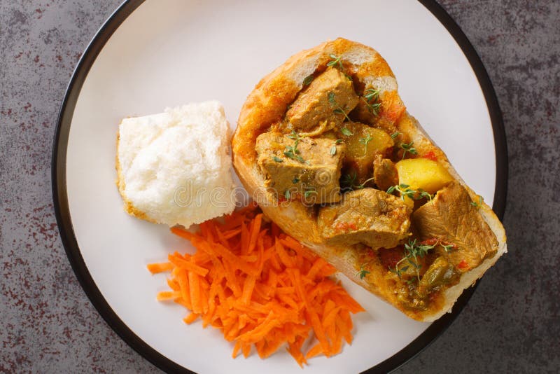 Traditional Durban Mutton Bunny Chow Closeup on Plate. Horizontal Top ...