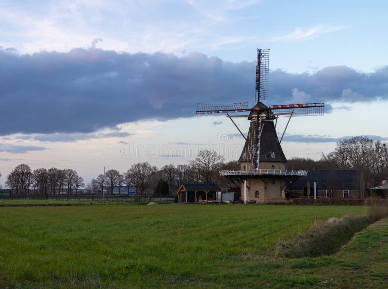 Traditional Dutch Grain Wind Mill in Oerle, North Brabant Stock Photo ...