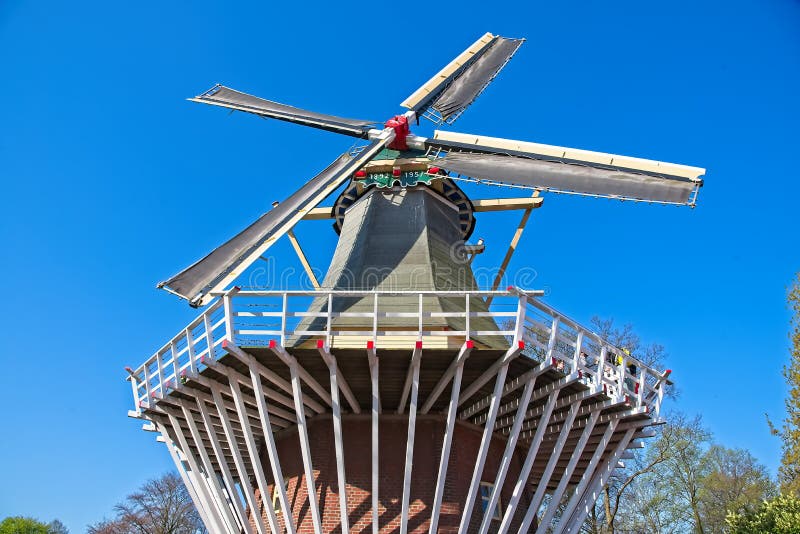 Traditional dutch windmill stock photo. Image of background - 156704990