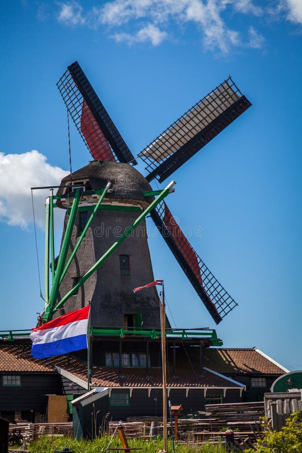 Traditional dutch windmill stock image. Image of clouds - 55561595