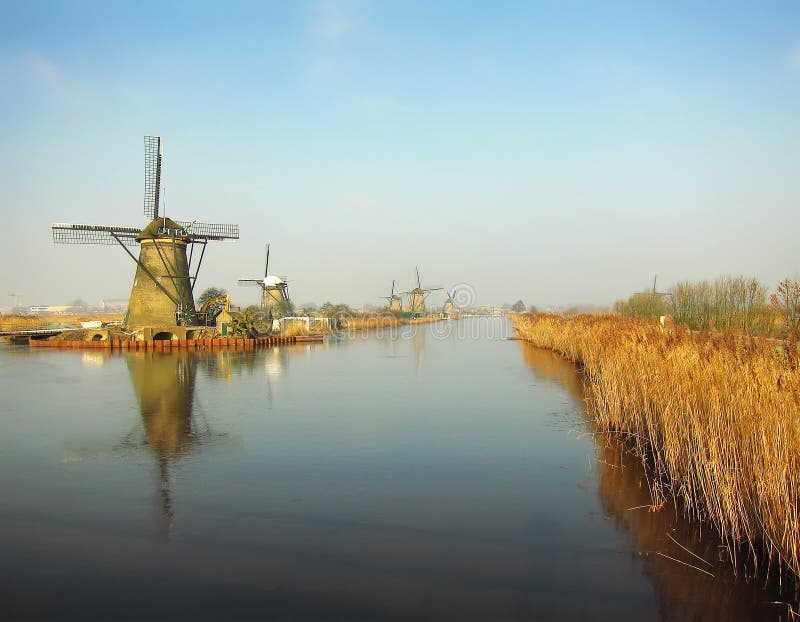 Traditional Dutch Windmills at Dawn Stock Photo - Image of landmark ...