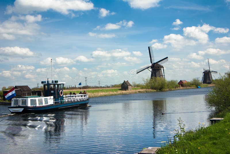 Traditional Dutch Windmills and Ship Stock Photo - Image of idyllic ...