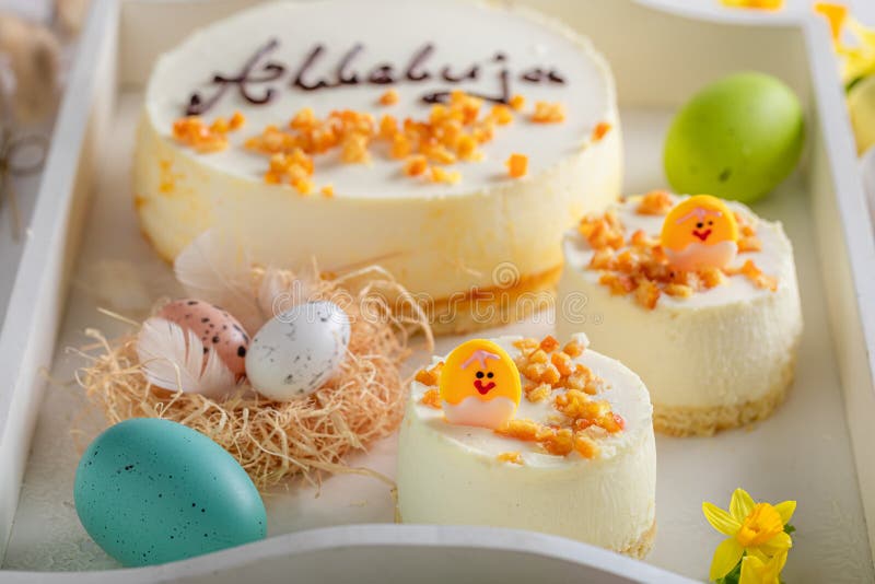 Traditional Easter Cake Surrounded by Spring Flowers and Eggs Stock ...