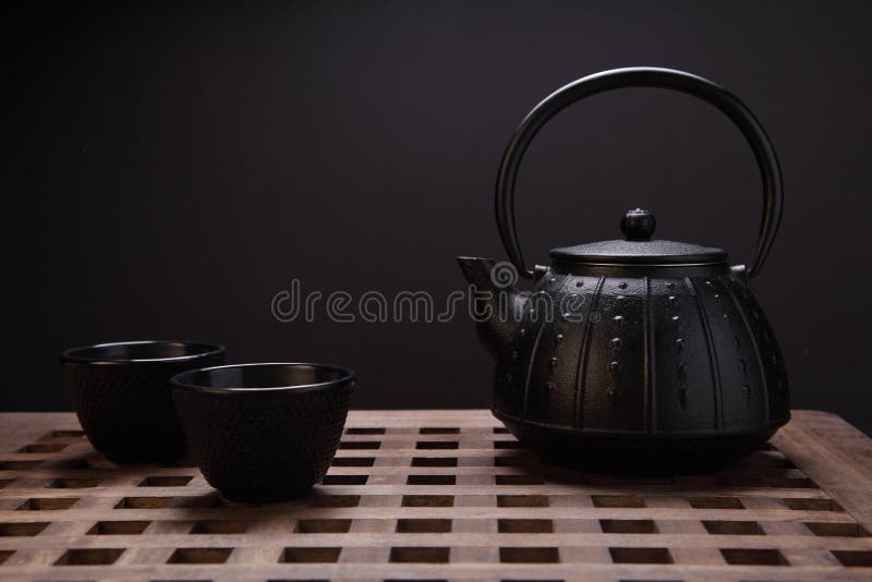 Traditional Eastern Teapot and Teacups on Wooden Desk Stock Image ...