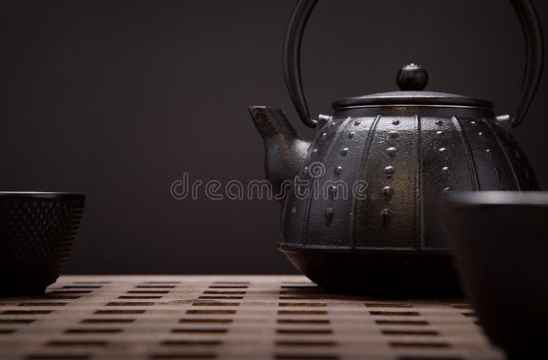 Traditional Eastern Teapot and Teacups on Wooden Desk Stock Photo ...