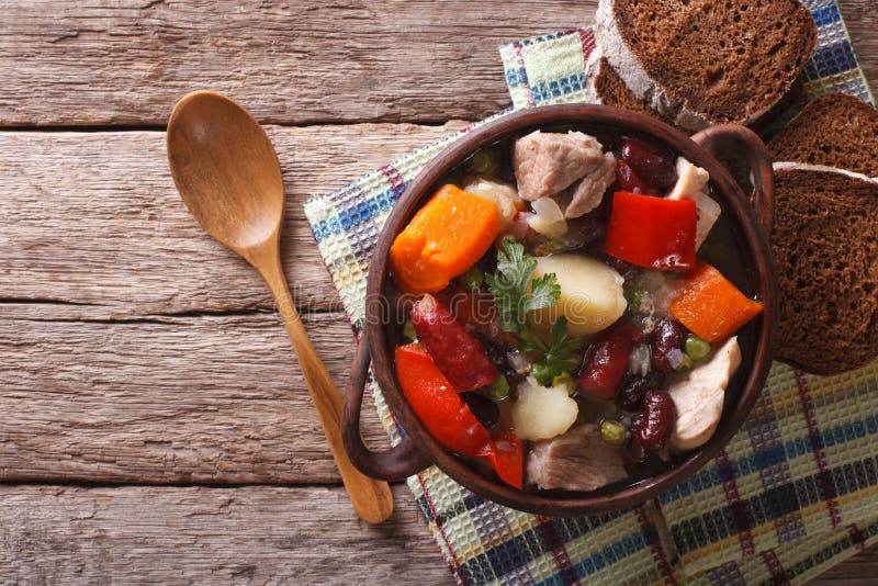 Traditional Eintopf Soup in the Pot on the Table. Horizontal Top Stock ...