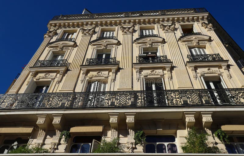 The Traditional Facade of Parisian Building, France. Stock Image ...
