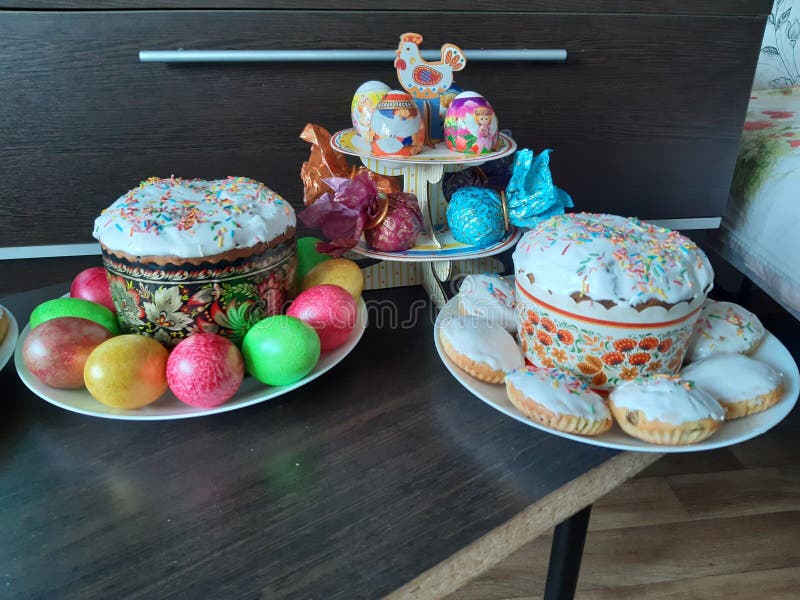 Traditional Festive Table Featuring Decorated Pastries and Colorful ...