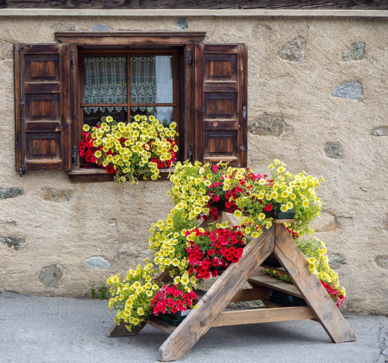 Traditional Flowered Windows at the Italian Alps and Dolomites Stock ...