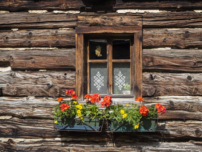 Traditional Flowered Windows at the Italian Alps and Dolomites Stock ...