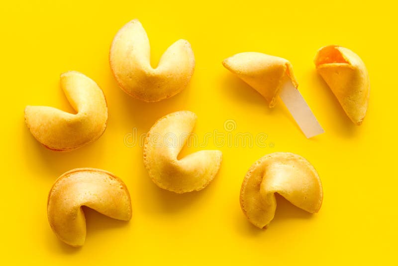 Traditional Fortune Cookies on Yellow Table Top-down Stock Image ...