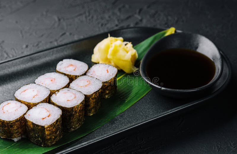 Traditional Fresh Japanese Sushi Maki on Black Stone Plate Stock Image ...