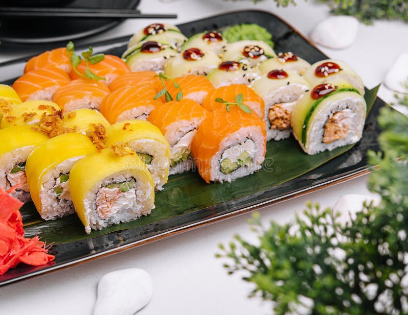 Traditional Fresh Japanese Sushi Rolls on Stone Plate Stock Photo ...