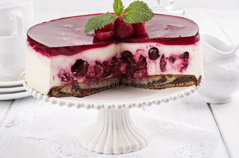 Traditional German Cheesecake with Cherry and Raspberry on a Cake Plate ...
