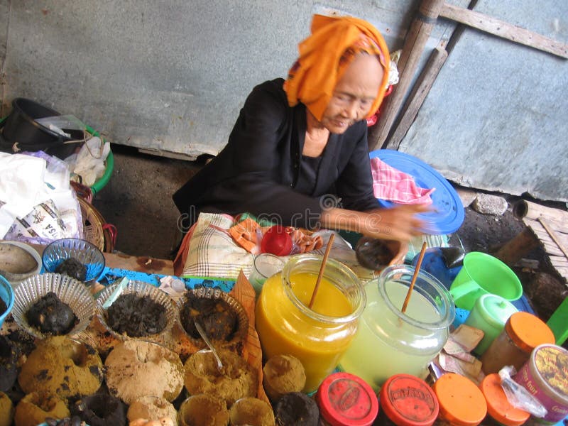 Traditional Herbal Medicine Maker Concocting Tonic in Dukun Village ...