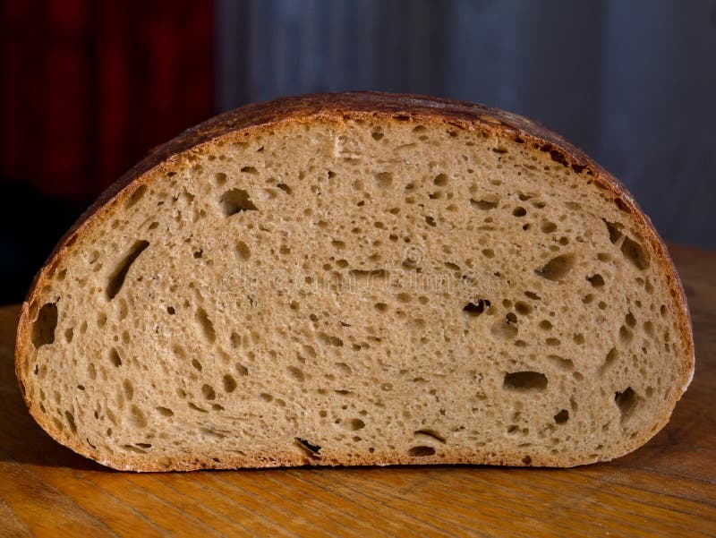 Traditional Homemade Bread - Side View of Halved Bread Stock Photo ...