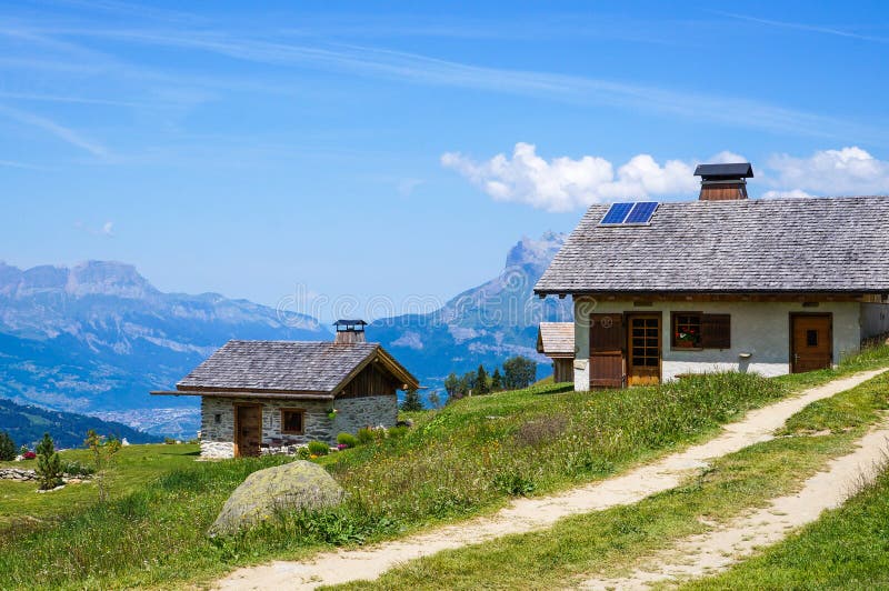 Traditional Houses in the Alps Stock Photo - Image of clouds, house ...