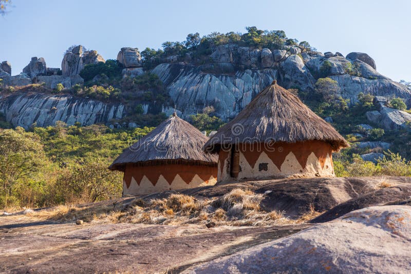 Traditional Huts in Front of Hill Complex - Great Zimbabwe Stock Image ...