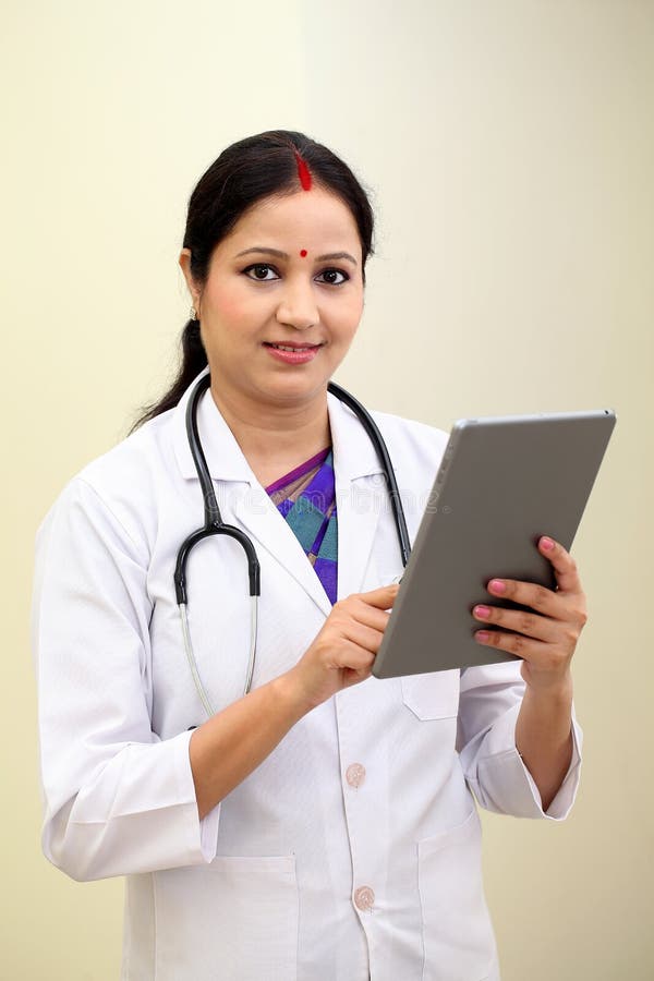 Traditional Indian Female Doctor Holding Tablet Computer Stock Photo ...