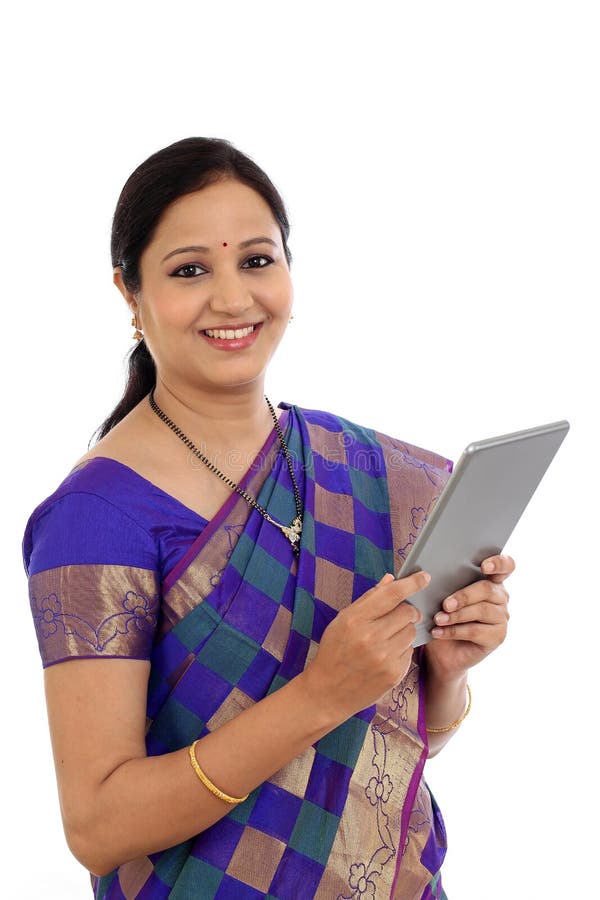 Traditional Indian Woman Using a Tablet Computer Stock Photo - Image of ...