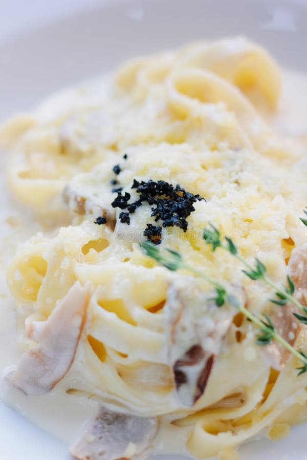 Traditional Italian Pasta with Mushrooms in a Restaurant Stock Photo ...