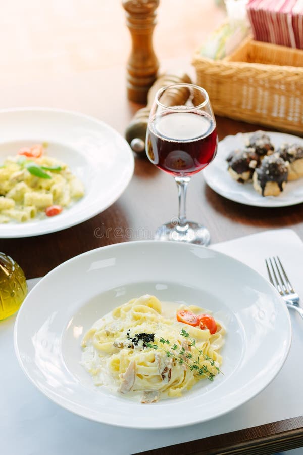 Traditional Italian Pasta with Mushrooms in a Restaurant Stock Photo ...