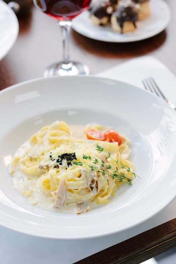 Traditional Italian Pasta with Mushrooms in a Restaurant Stock Photo ...