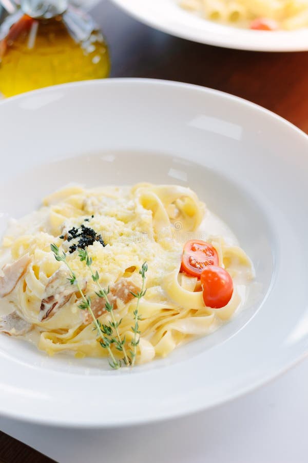 Traditional Italian Pasta with Mushrooms in a Restaurant Stock Photo ...