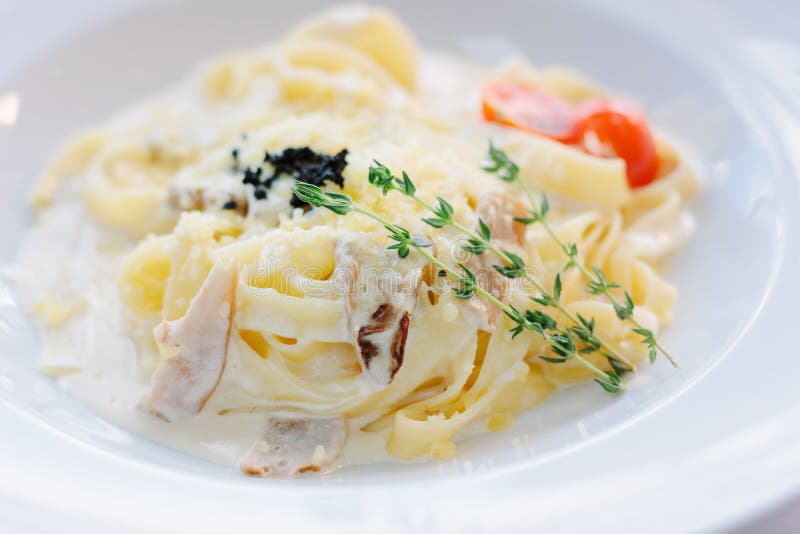 Traditional Italian Pasta with Mushrooms in a Restaurant Stock Image ...