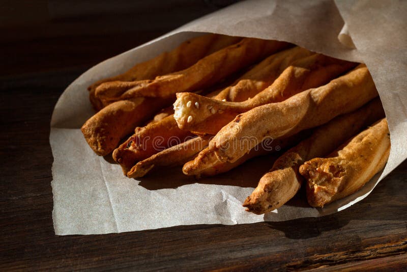 Traditional Italian Snack, Bread - Grissini. on a Dark Stone Table, Top ...