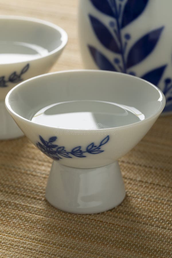 Japanese cups with sake stock image. Image of tradition - 117143797