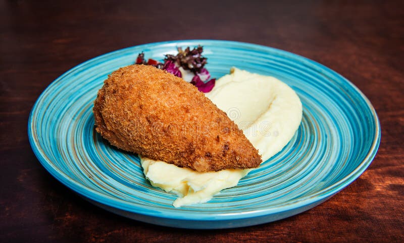 Traditional Kiev Cutlet with Mashed Potatoes and Salad Stock Image ...