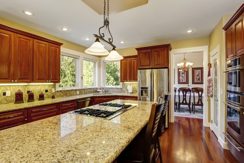 Traditional Kitchen with Nice Counters and Dark Hardwood Floor. Stock ...