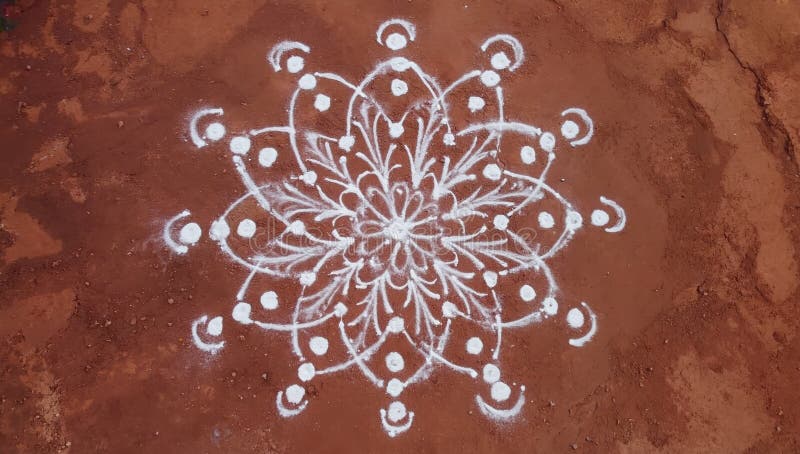 Traditional Kolam Design Featuring a Circular Pattern with Symmetrical ...