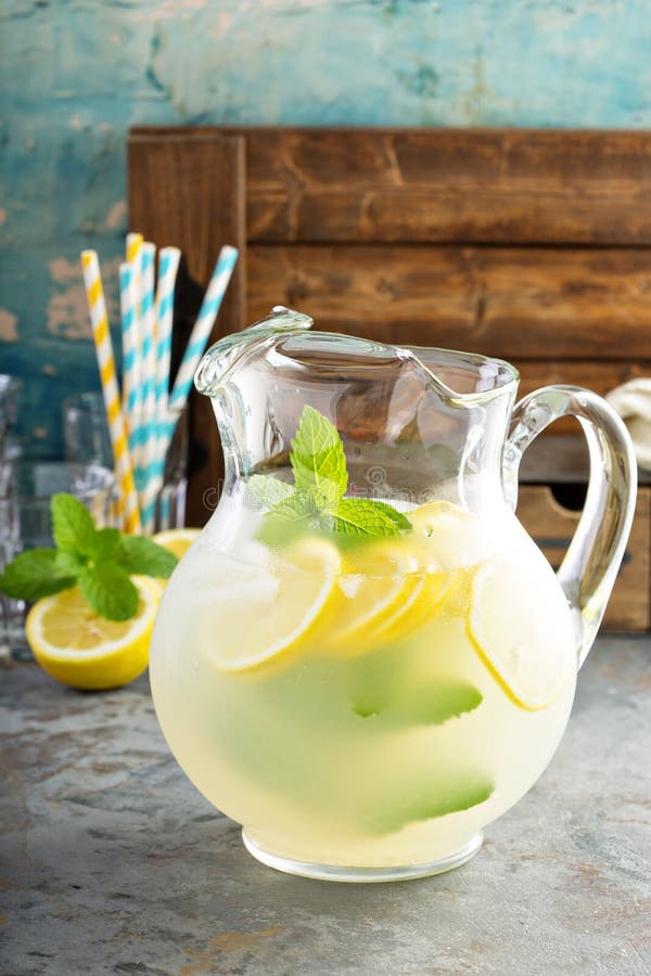 Pitcher Of Ice Cold Lemonade And Fruit Outside In Summer Stock Photo ...