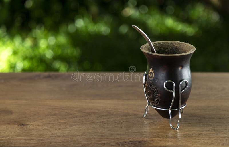 Traditional Mate Made of Calabash Over a Wooden Table Outdoors Stock ...