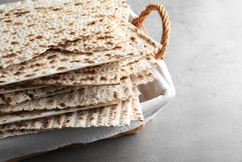 Traditional Matzos in Basket on Light Grey Table, Closeup Stock Image ...
