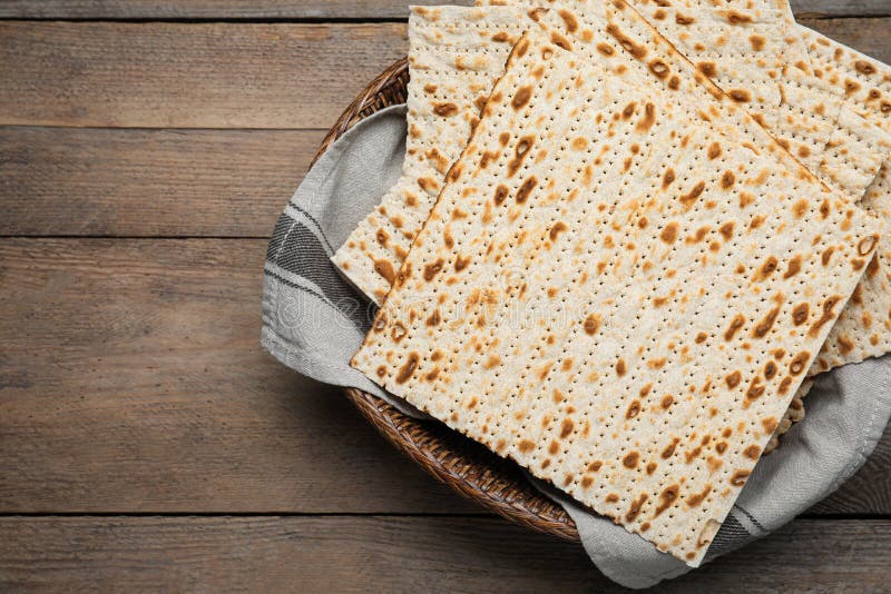 Traditional Matzos in Basket on Wooden Table, Top View Stock Photo ...