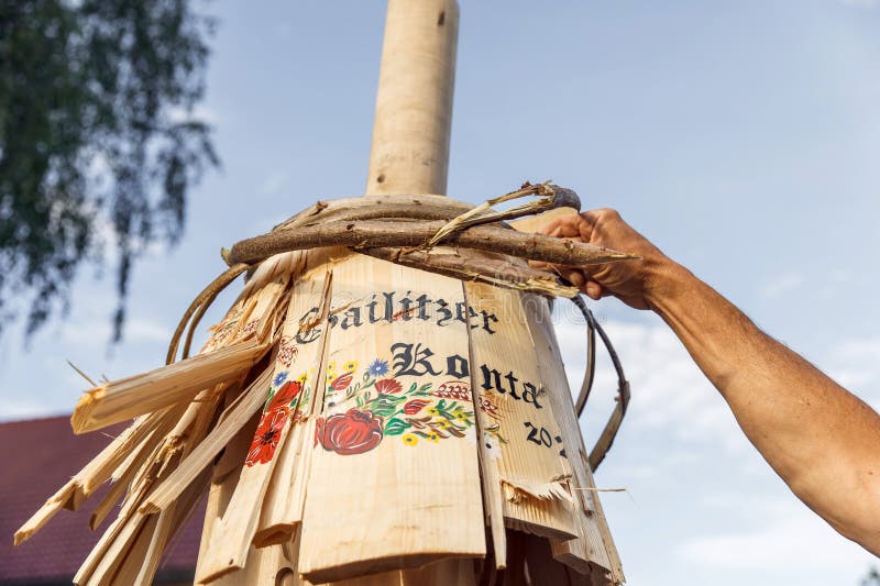 Traditional Maypole Decoration with Hand Holding Wreath in Outdoor ...