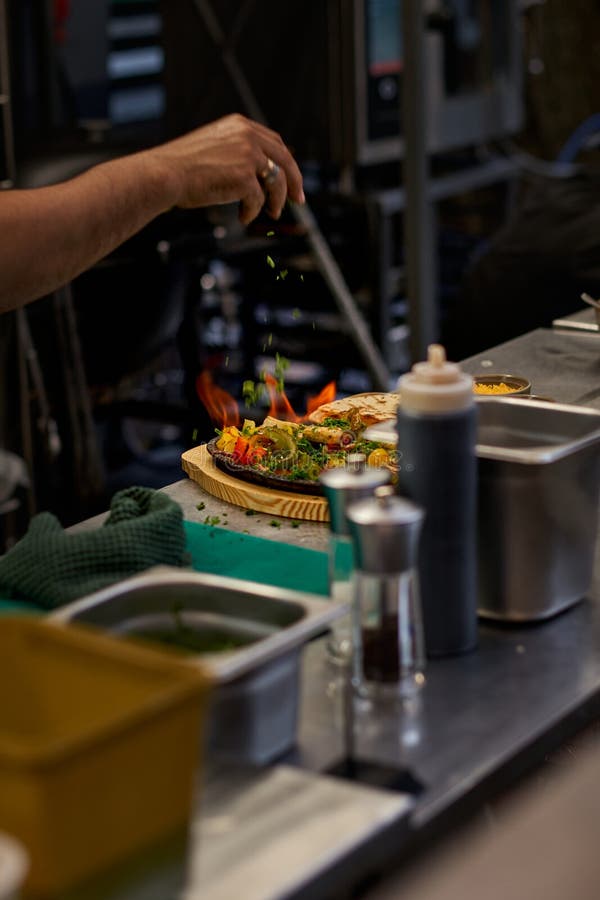 Traditional Mexican Beef Fajitas on Fire in the Kitchen, Also Called ...