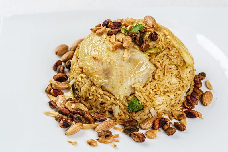 Traditional Middle Eastern Fish and Fried Rice Dish with Fried Pine ...