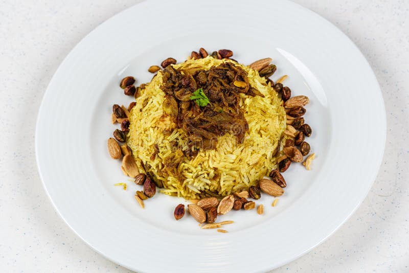 Traditional Middle Eastern Fish and Fried Rice Dish with Fried Pine ...
