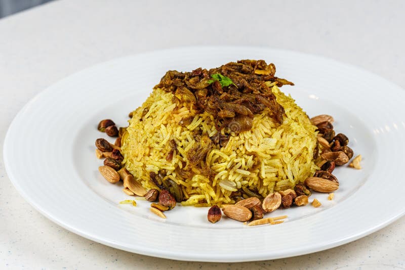 Traditional Middle Eastern Fish and Fried Rice Dish with Fried Pine ...