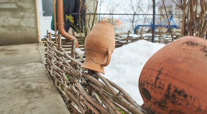 Traditional Moldovan Clay Pot on a Fence. Stock Photo - Image of ...