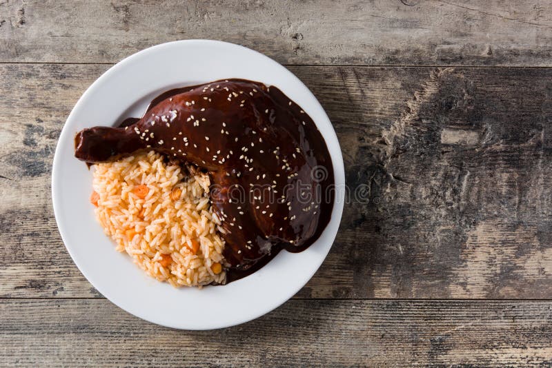 Traditional Mole Poblano with Rice in Plate Stock Photo - Image of keto ...