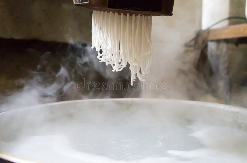 Traditional Noodles Making on a Vintage Machine Stock Image - Image of ...